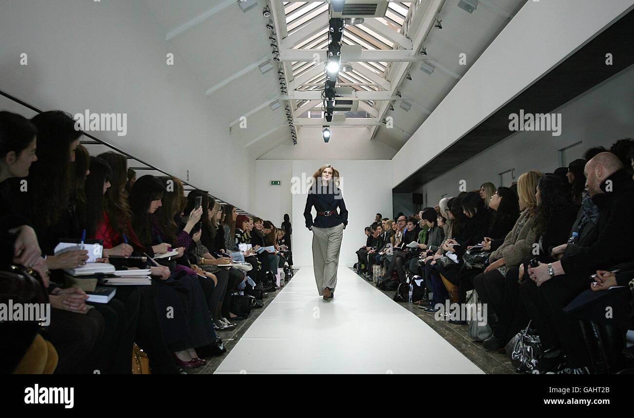 A model wears a creation by designer Margaret Howell, during London ...