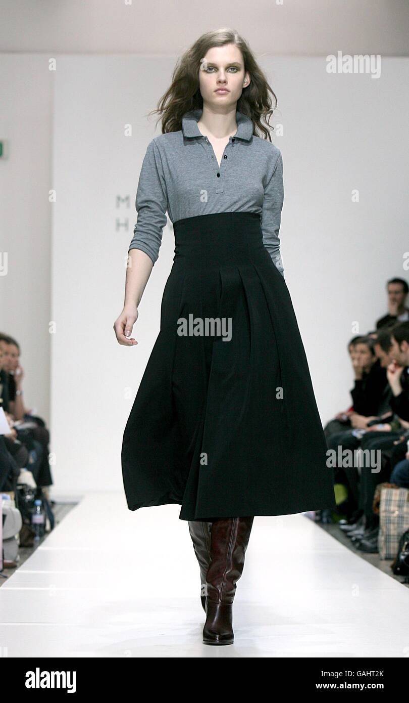 A model wears a creation by designer Margaret Howell, during London ...