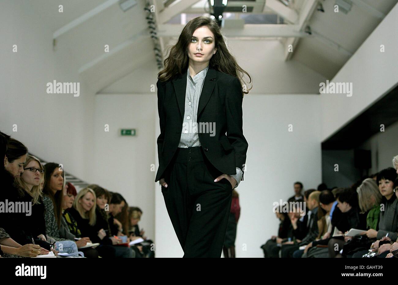 A model wears a creation by designer Margaret Howell, during London ...