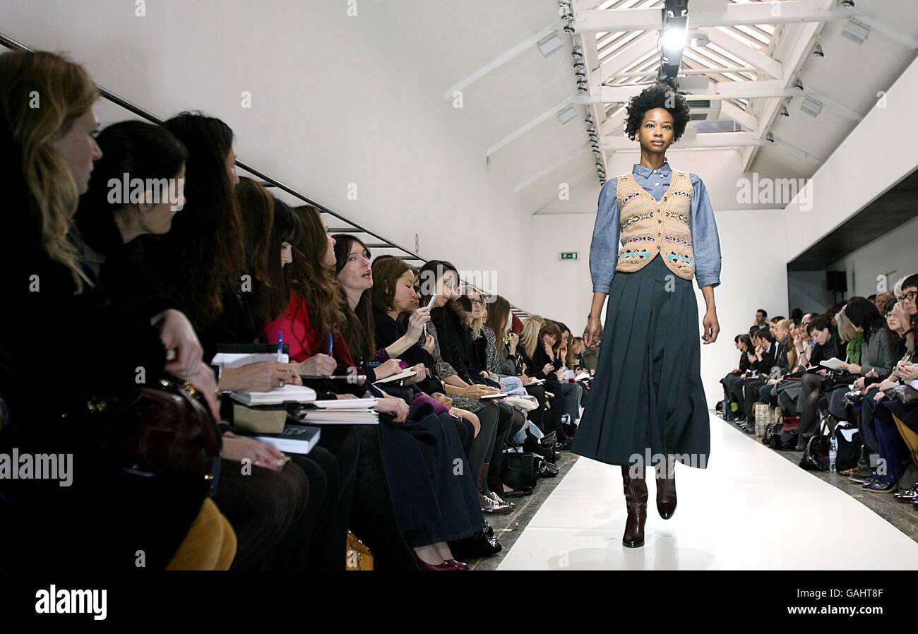 A model wears a creation by designer Margaret Howell, during London ...