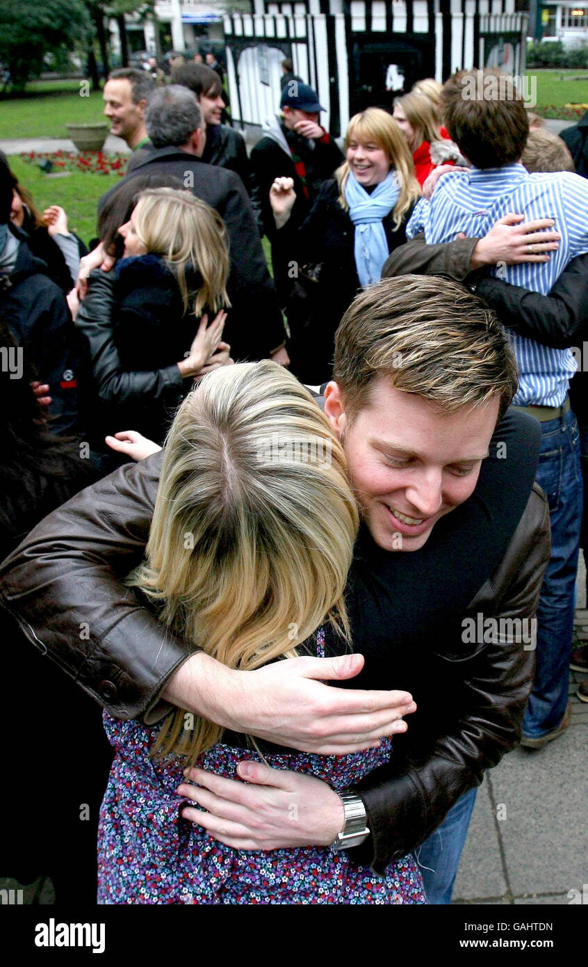 A crowd of strangers embrace in Soho Square, London, as they take part ...