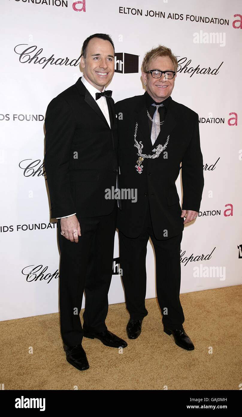 Sir Elton John and his partner David Furnish arrive for the 16th Annual ...