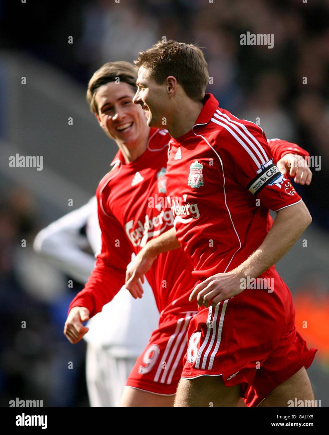 Liverpool's Steven Gerrard celebrates after his shot forced Bolton ...