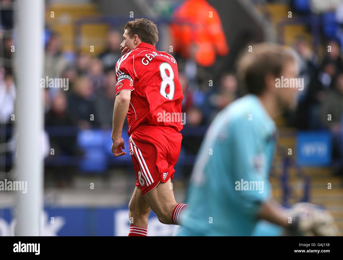 Liverpool's Steven Gerrard celebrates after his shot forced Bolton ...