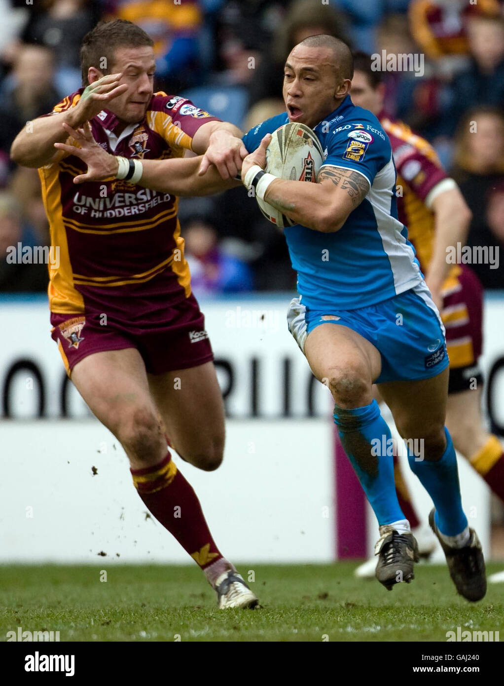 Hull FC's Motu Tony gets past Hudderfield's Steve Snitch during the ...