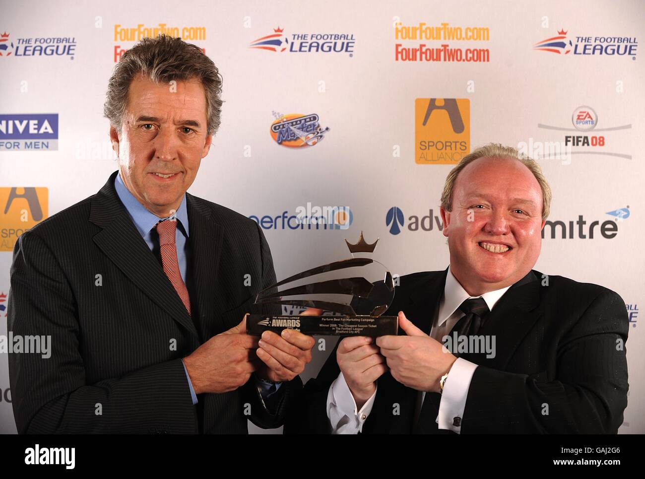 Bradford City's Mark Lawn (right) stands with his award for Perform ...