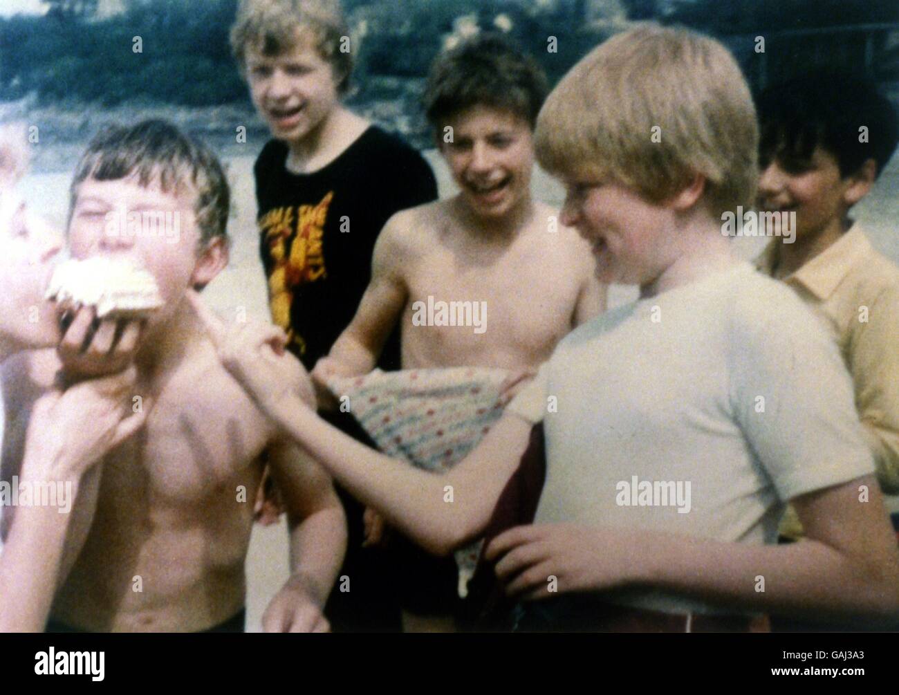 Young alan shearer tucks into cream cake whilst on holiday hi-res stock ...