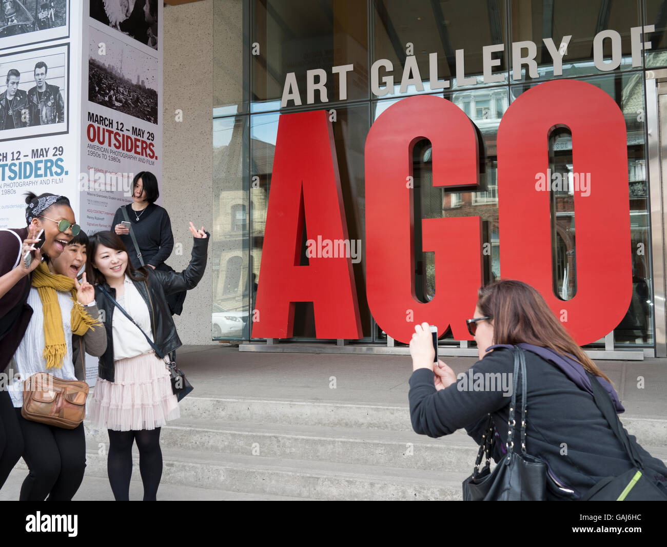 Exterior view of AGO Toronto. Tourists taking photographs. Art Gallery ...