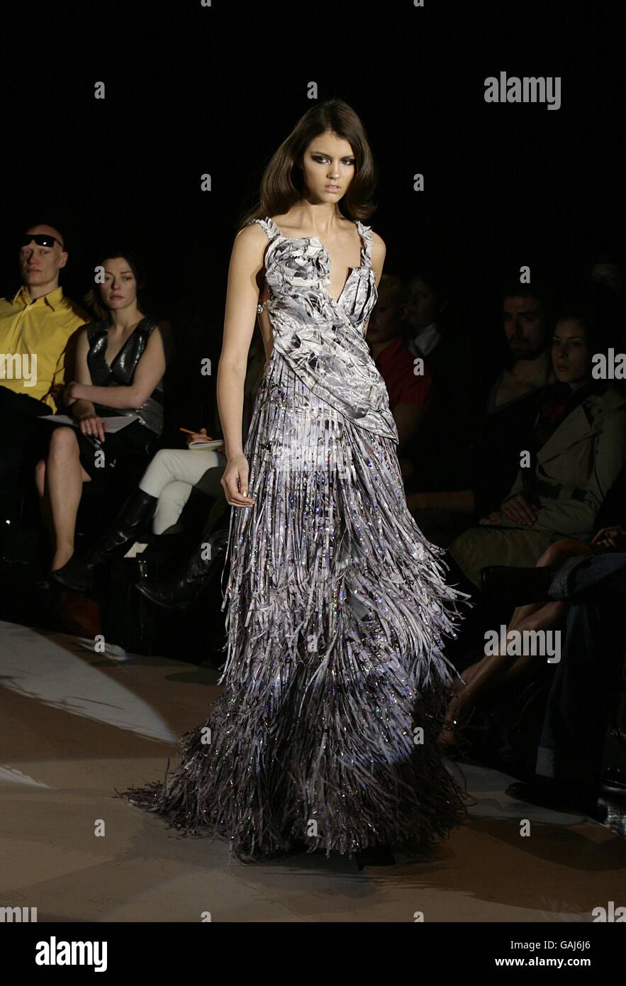 A model wears a creation by designer Ashley Isham, during London ...