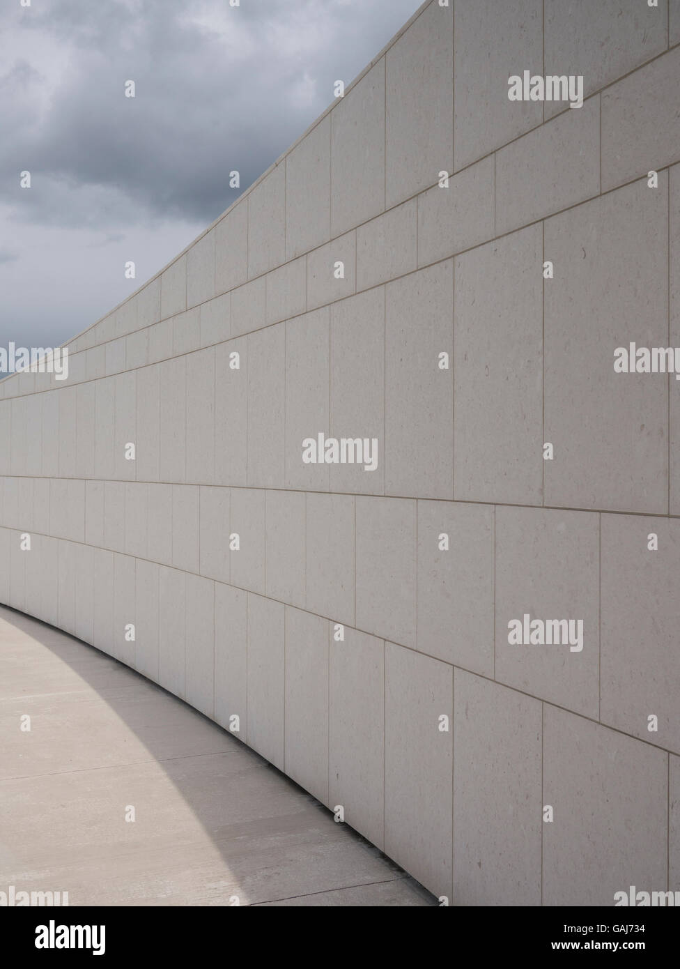Abstract view of wall & sidewalk Stock Photo - Alamy