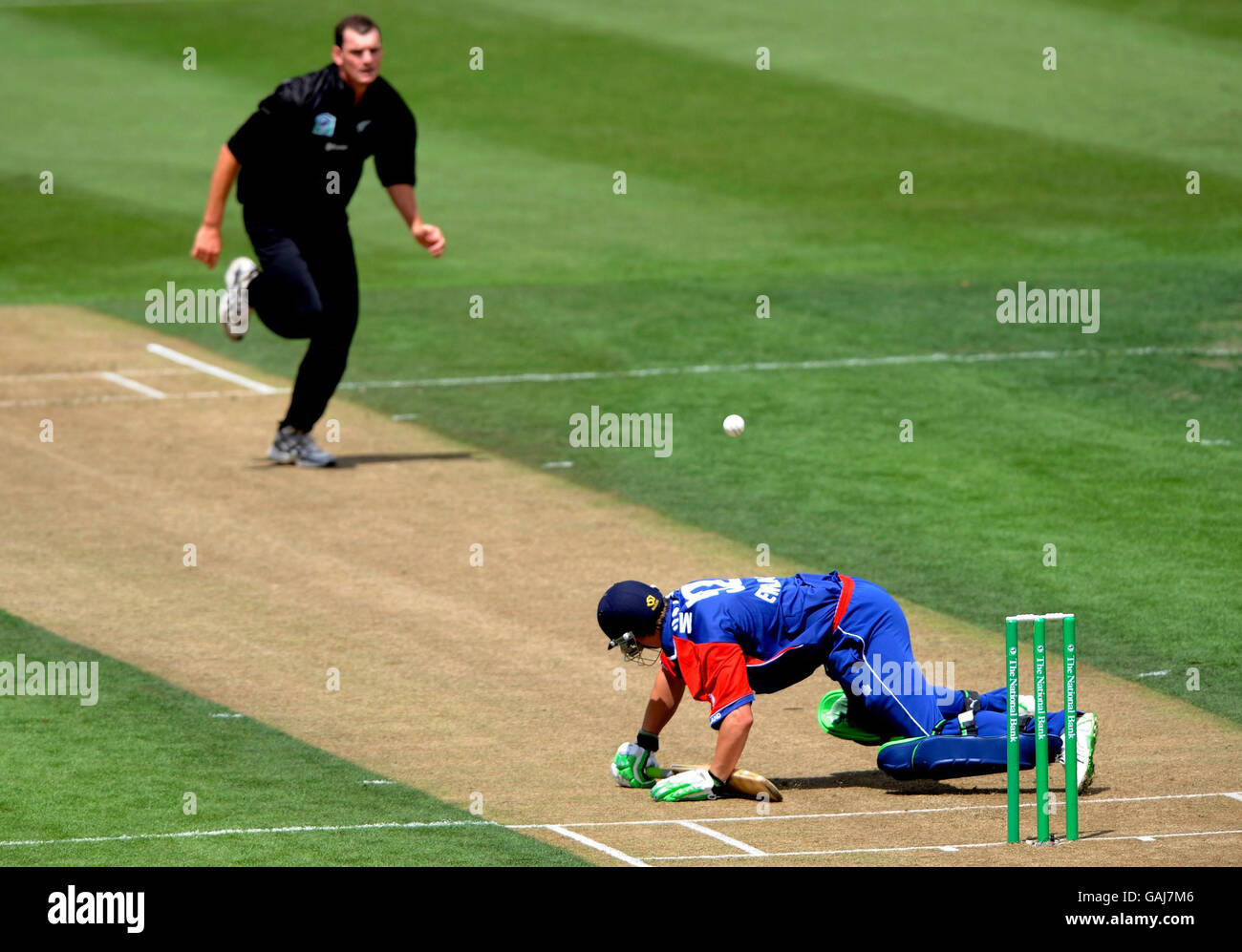 England's Phil Mustard survives a ball from New Zealand bowler Kyle ...
