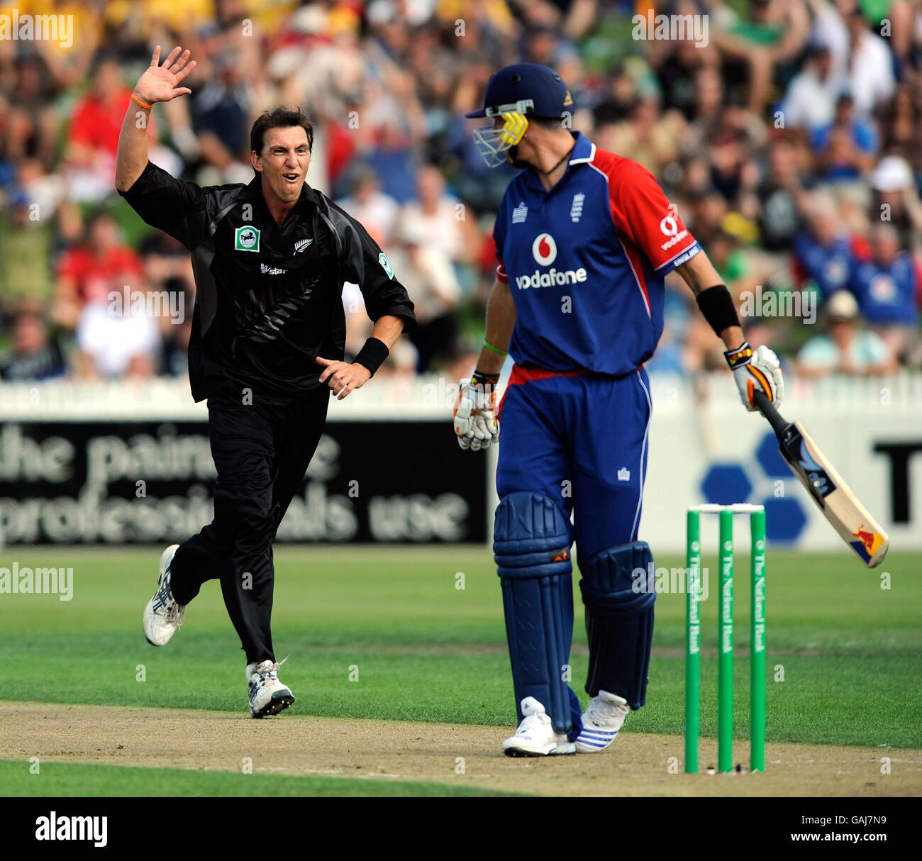 New Zealand's Michael Mason celebrates the wicket of England's Kevin ...