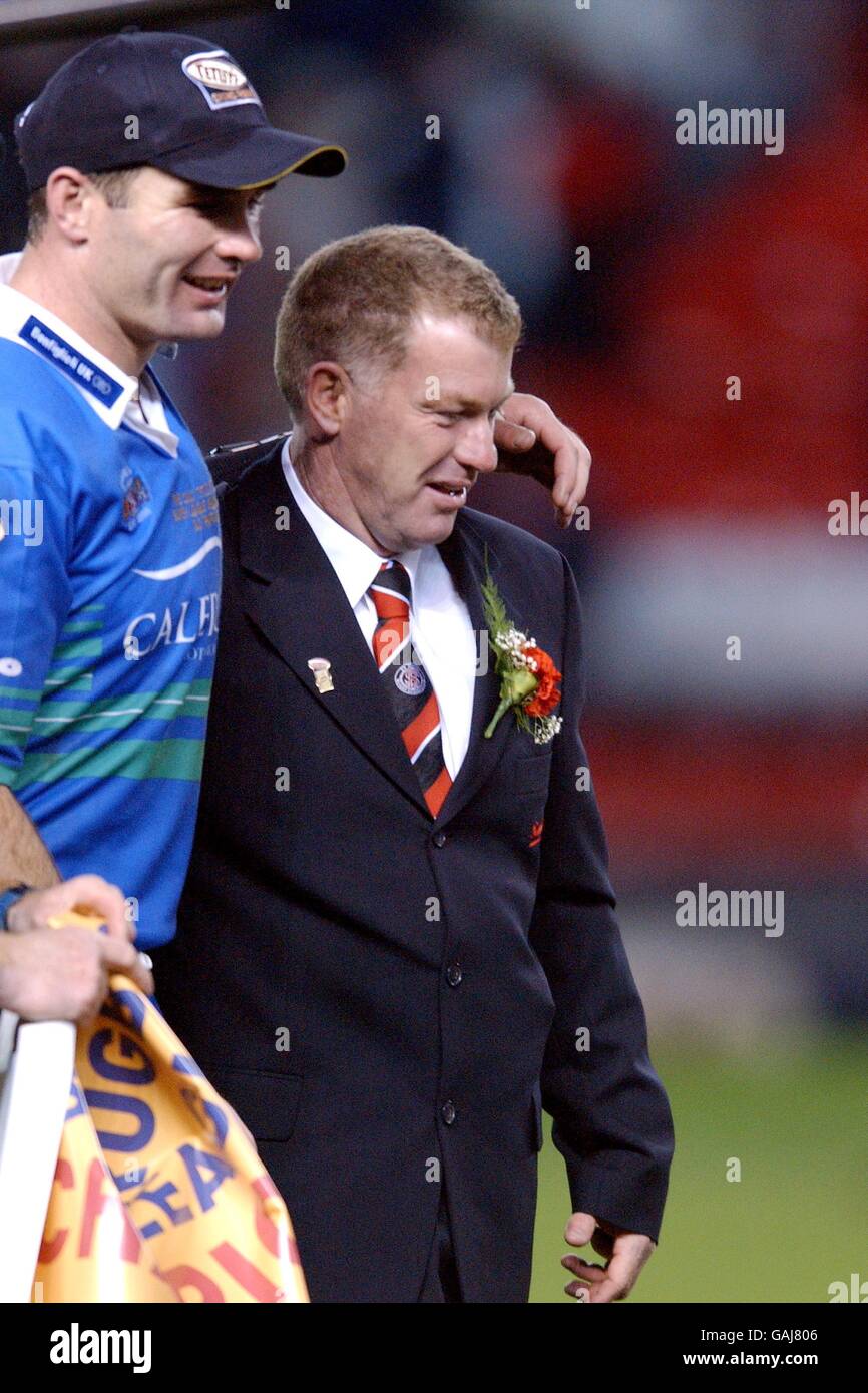 Saint Helens Saints' Chris Joynt (l) puts his arm around coach Ian ...