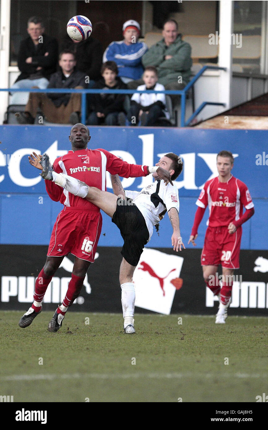 Luton Towns Keith Keane and Leyton Orients Jabo Ibehre fight for the ...