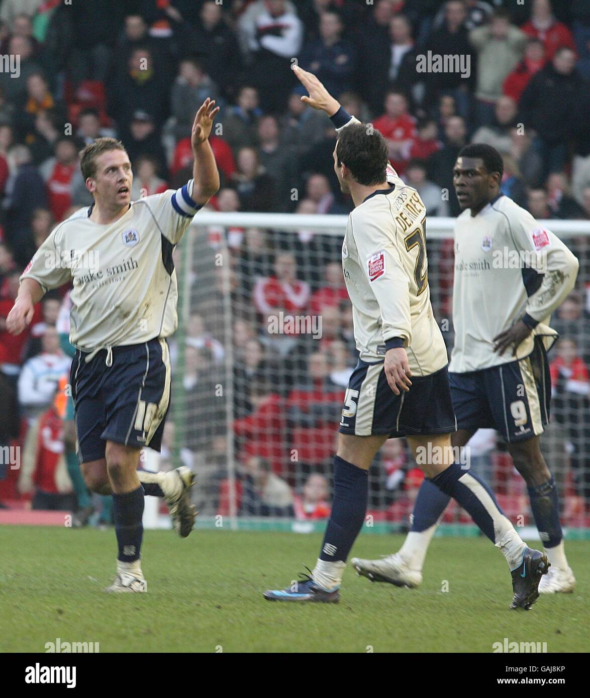 Barnsley's goalscorer Brian Howard celebrates with his team mates ...