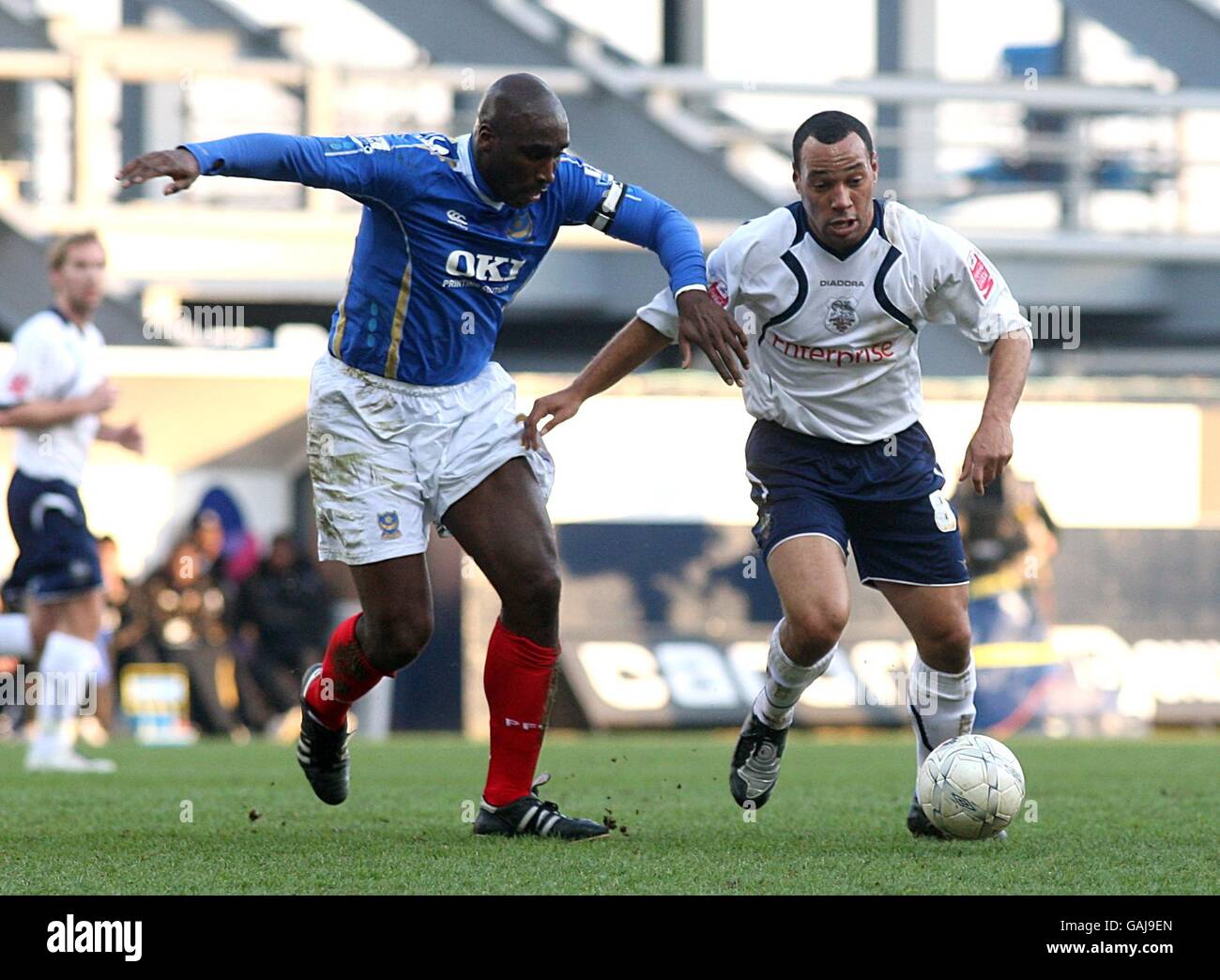 Preston North End's Karl Hawley and Portsmouth's Sol Campbell (l ...