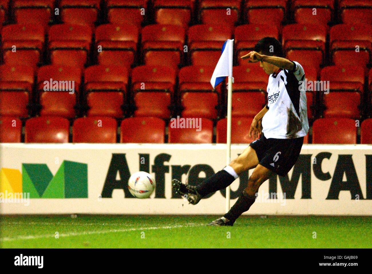 Fulham's Junichi Inamoto takes a corner during the game with Wigan ...