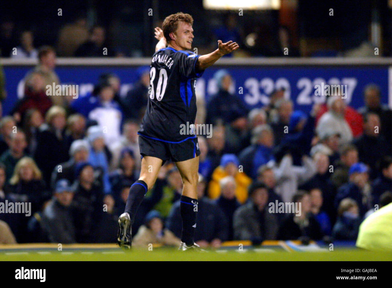 Chelsea's Jesper Gronkjaer celebrates scoring the third goal against ...