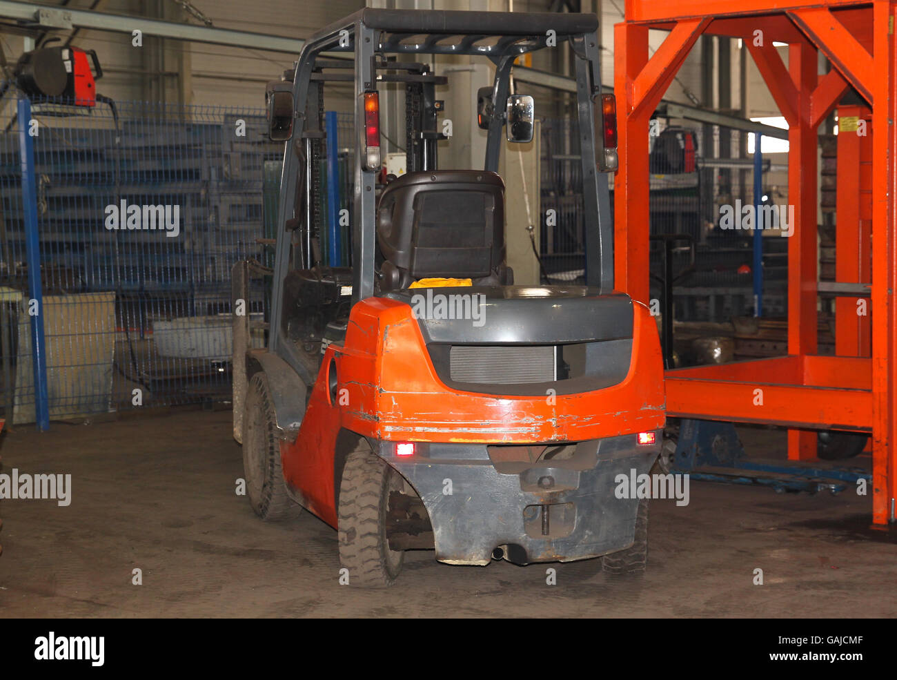 small nimble Electric Forklift for work in production Stock Photo - Alamy