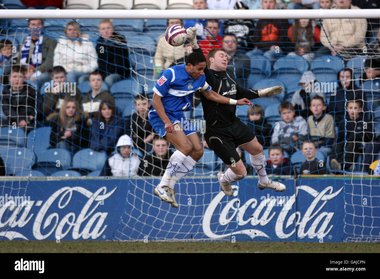 Stockport countys stand in goalkeeper adam proudlock makes a save hi ...