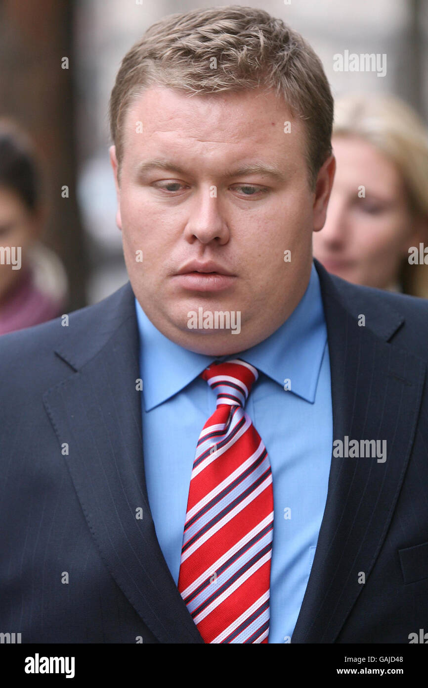 Compulsive gambler Graham Calvert (centre) arrives at the High Court in ...