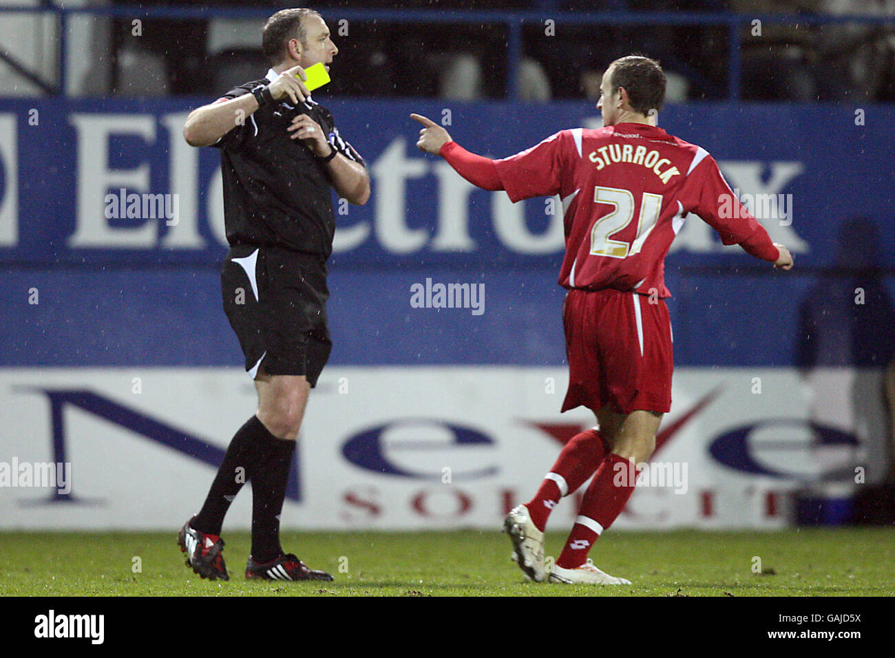 Swindon Town's Blair Sturrock (r) shows his opinion to match referee ...