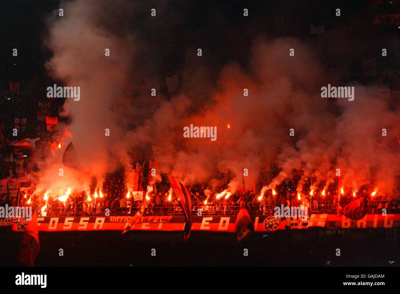 Ac milan supporters cheer on their team hi-res stock photography and ...