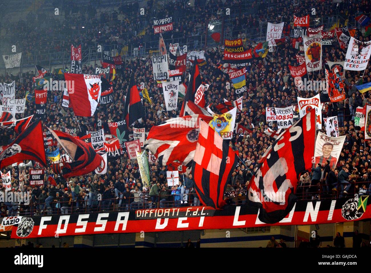 Ac milan supporters cheer on their team hi-res stock photography and ...