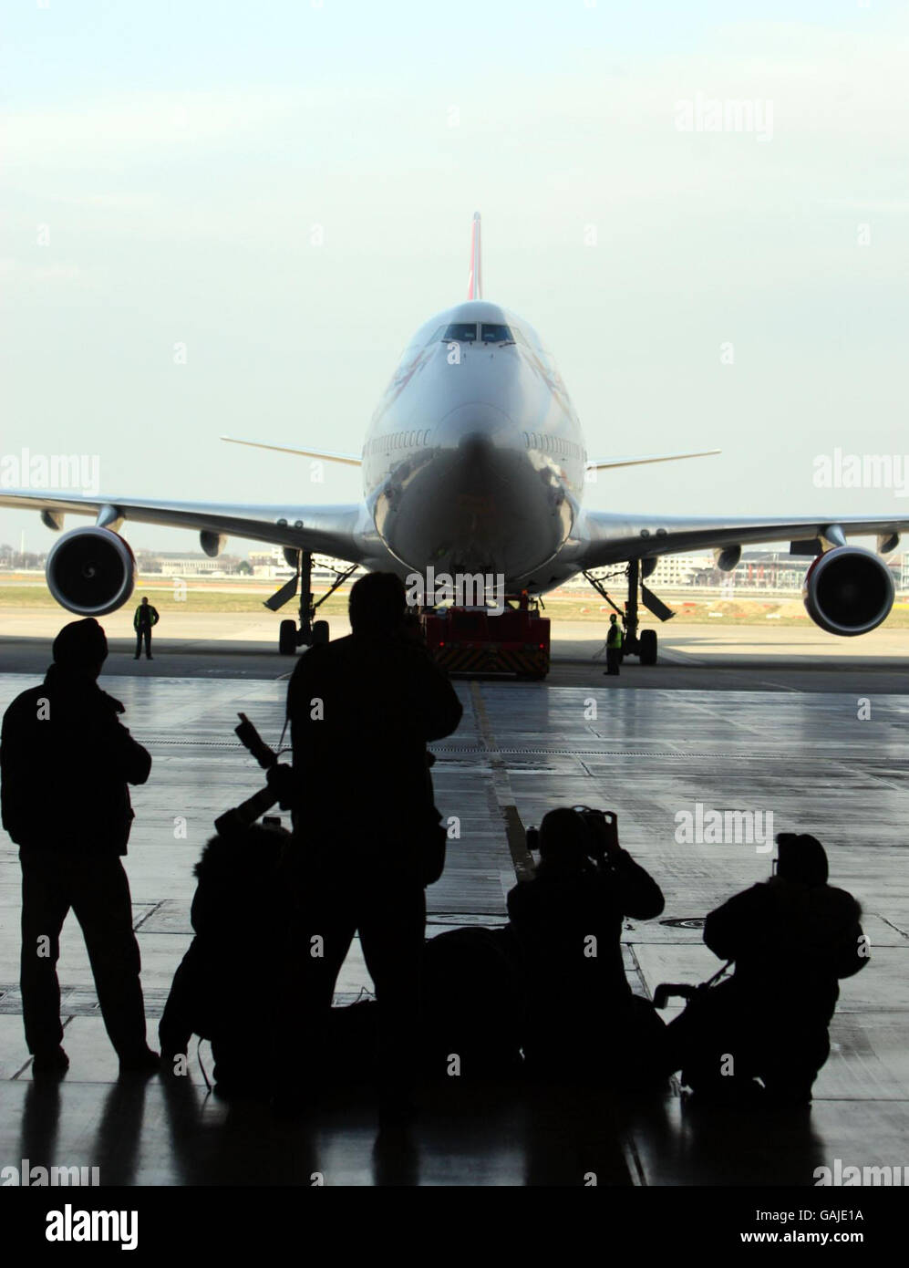 Virgin Atlantic's 747 is pushed out of the Virgin Hanger at Heathrow ...