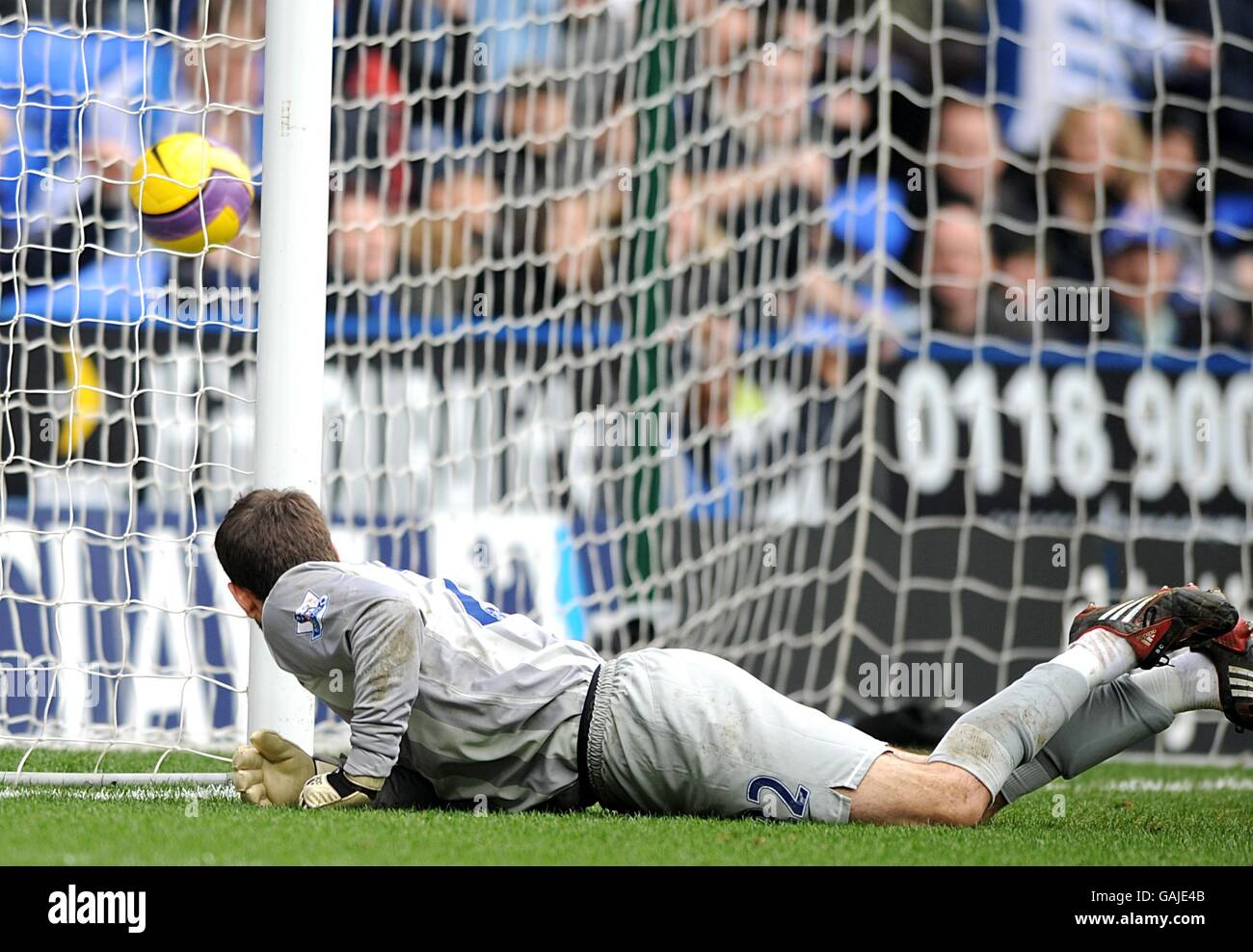 Aston Villa goalkeeper Scott Carson looks back at the ball in the net ...