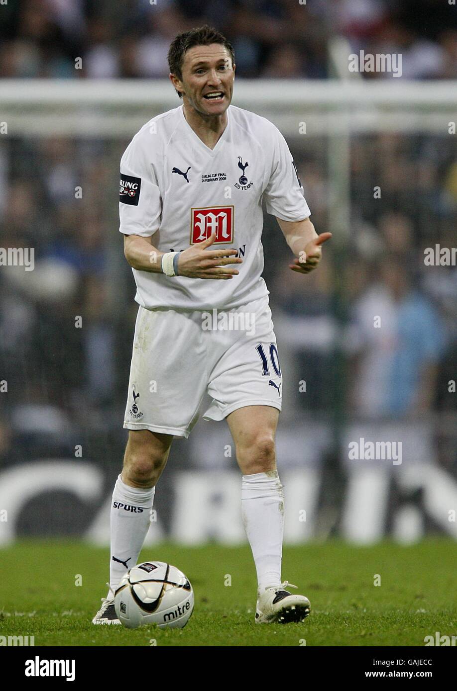 Tottenham Hotspur's Robbie Keane gives out instructions after his side ...