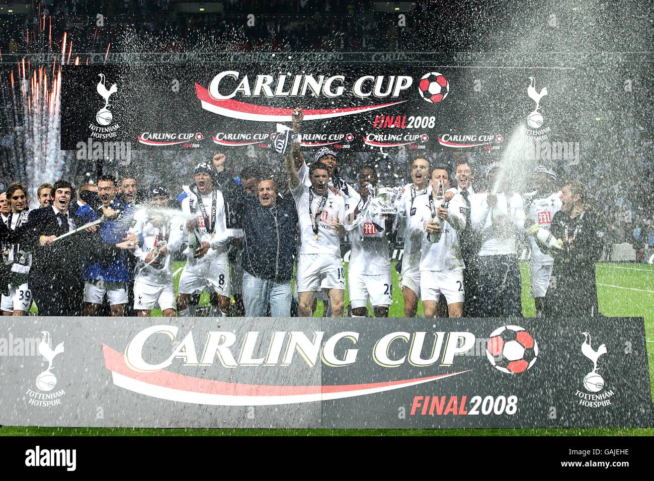 Tottenham Hotspur players celebrate with the trophy after the final ...