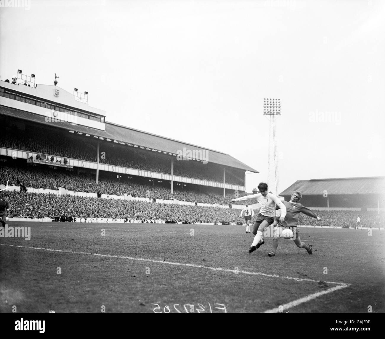 L r tottenham hotspurs peter collins tackles liverpools alun evans hi ...
