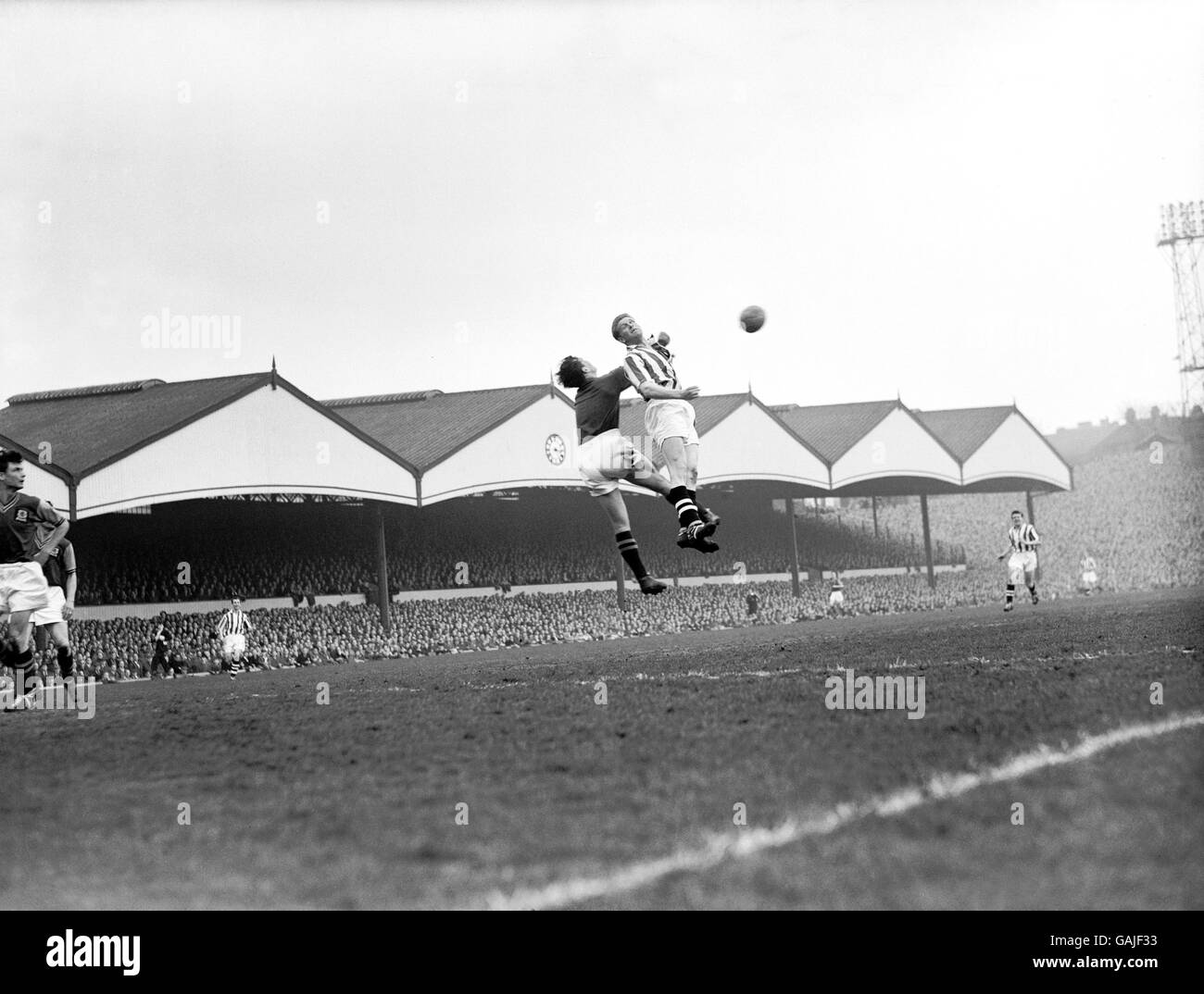(L-R) Aston Villa goalkeeper Nigel Sims punches clear from West ...