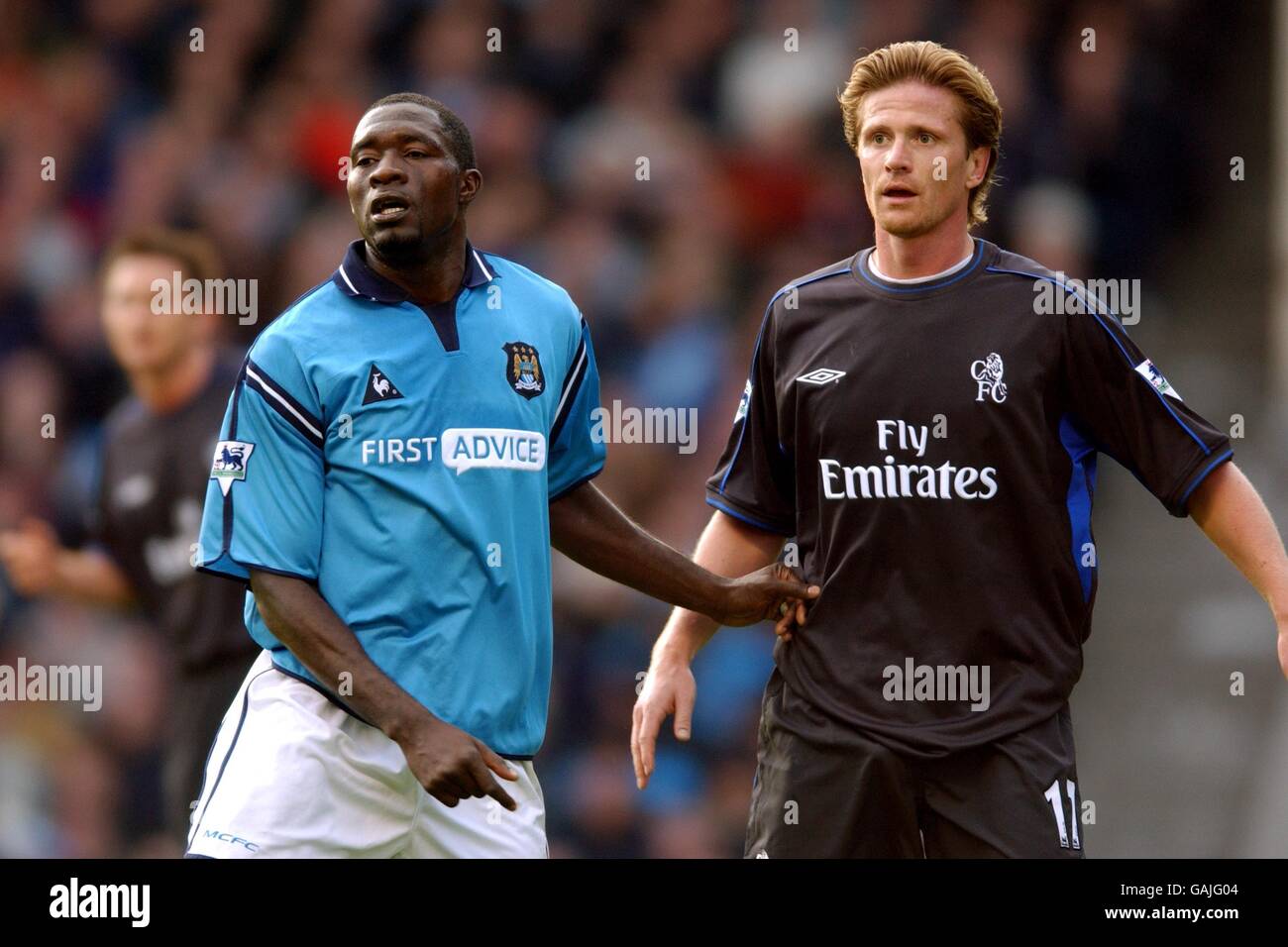 (L-R) Manchester City's Marc Vivien Foe and Chelsea's Emmanuel Petit ...