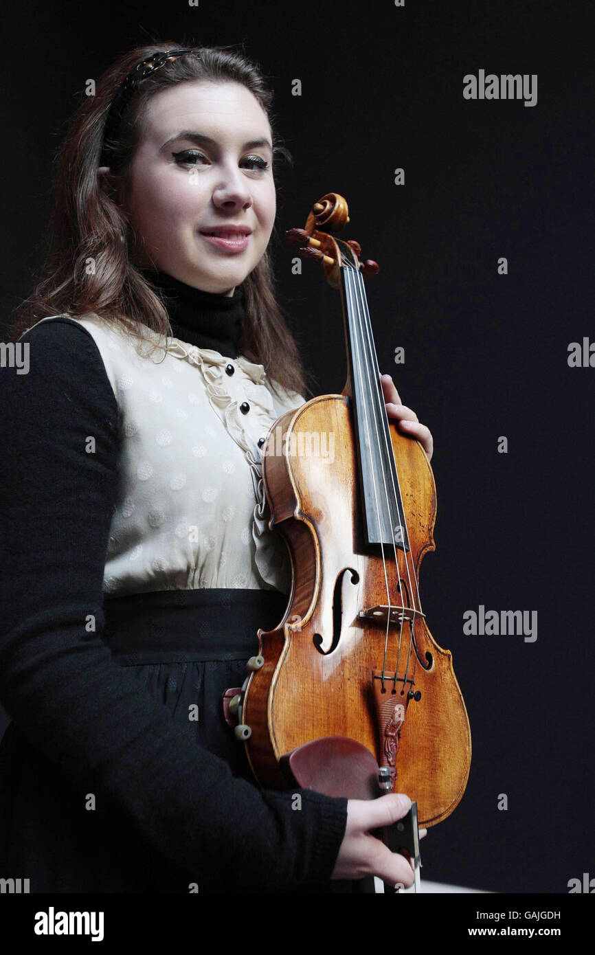 Violinist Chloe Hanslip holds a Guarneri del Gesu violin was once owned ...