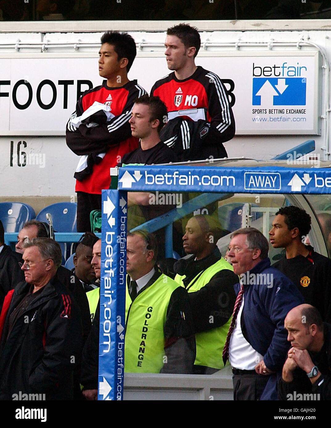 Fulham's Junichi Inamoto watches the game against Manchester United ...