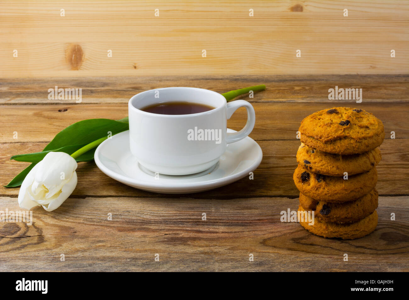 Сup of tea and crispy cookies. Tea cookies. Tea time. Biscuits ...