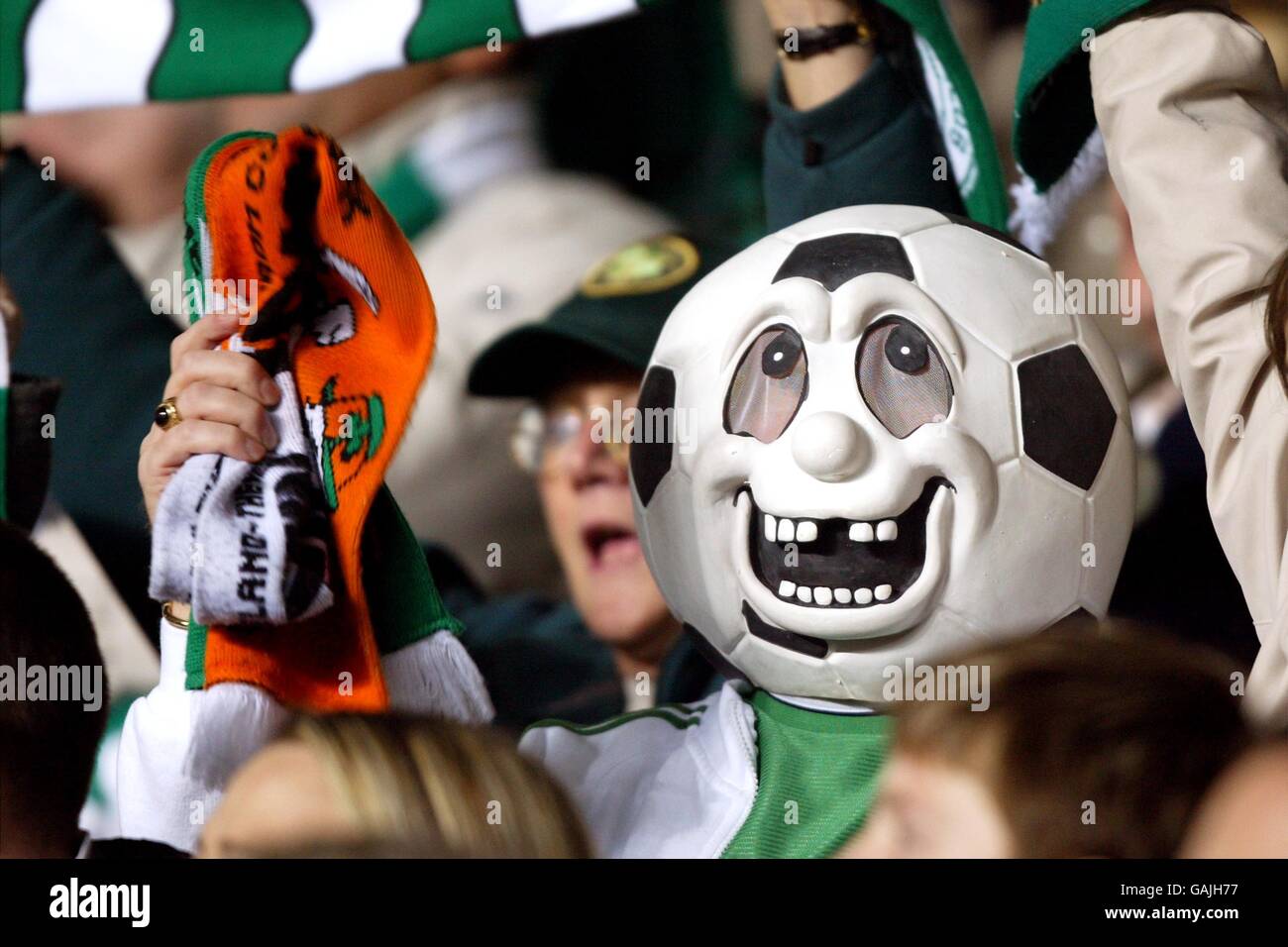 A celtic fan with a football mask hi-res stock photography and images ...