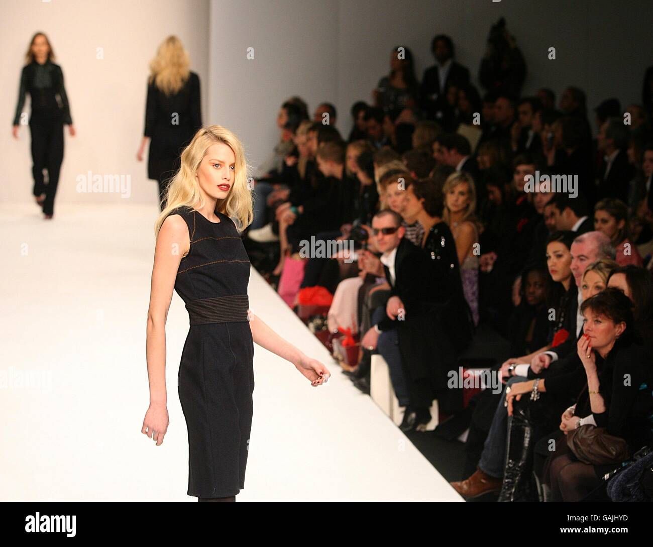 A model wears a creation by designer Issa, during London Fashion Week ...