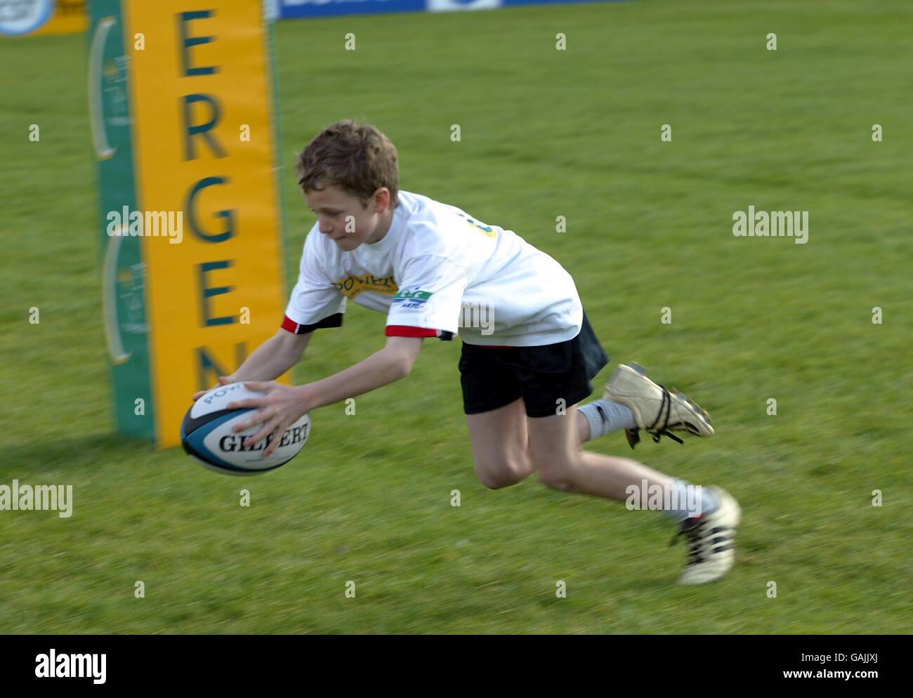 A young Rugby fan practices his try scoring at the launch of the ...