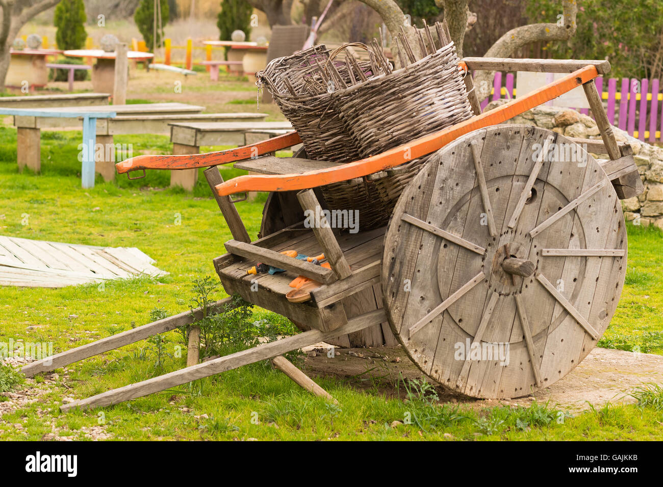 Old retro transport wagon out in a park Stock Photo - Alamy