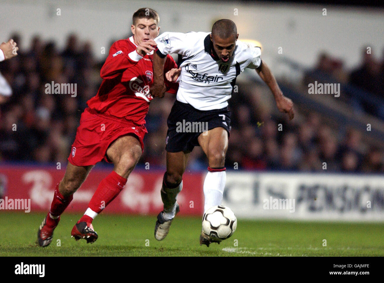 Fulhams steve marlet gets away from steven gerrard of liverpool hi-res ...