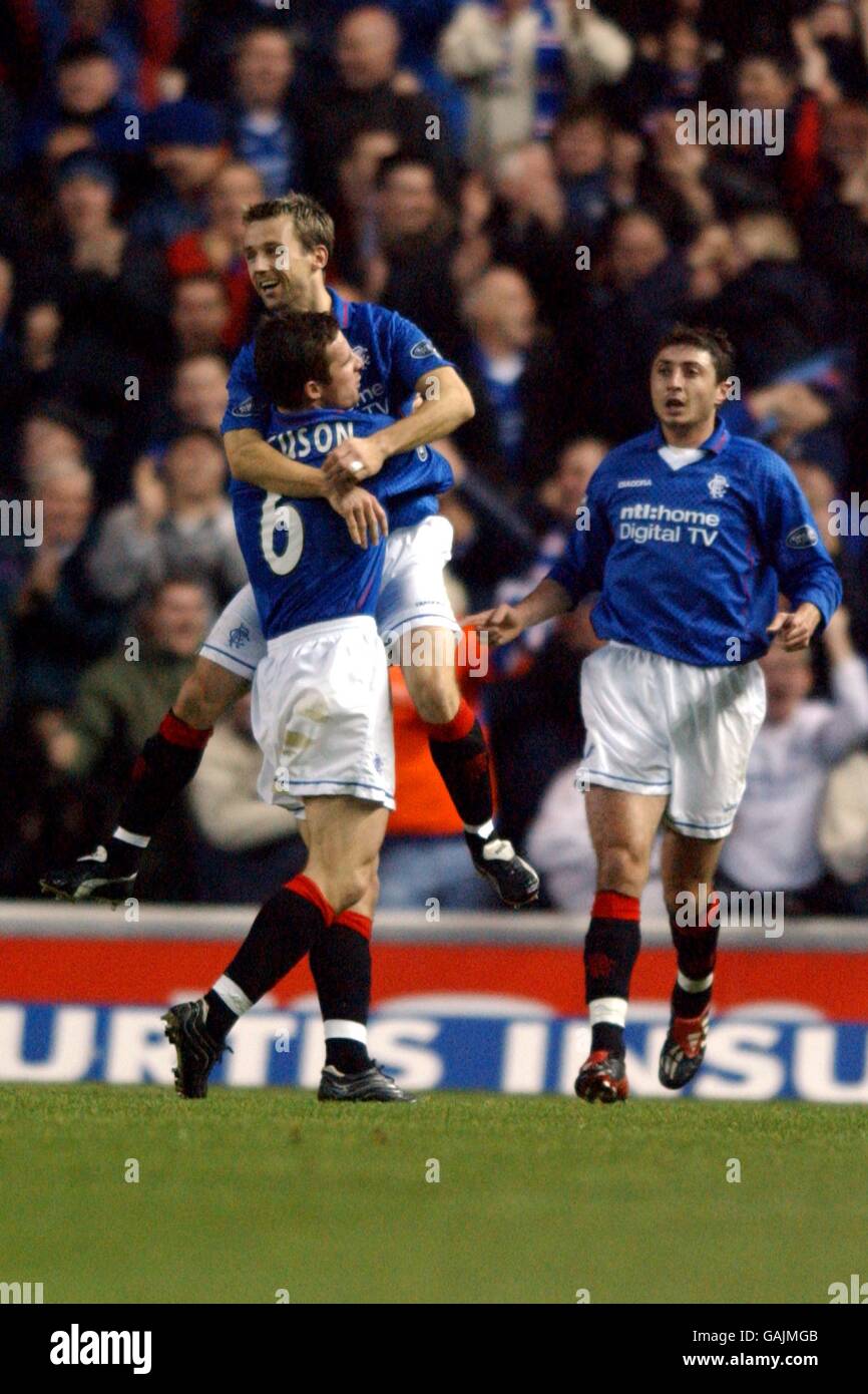 Rangers' Neil McCann celebrates scoring against Dunfermline with Barry ...