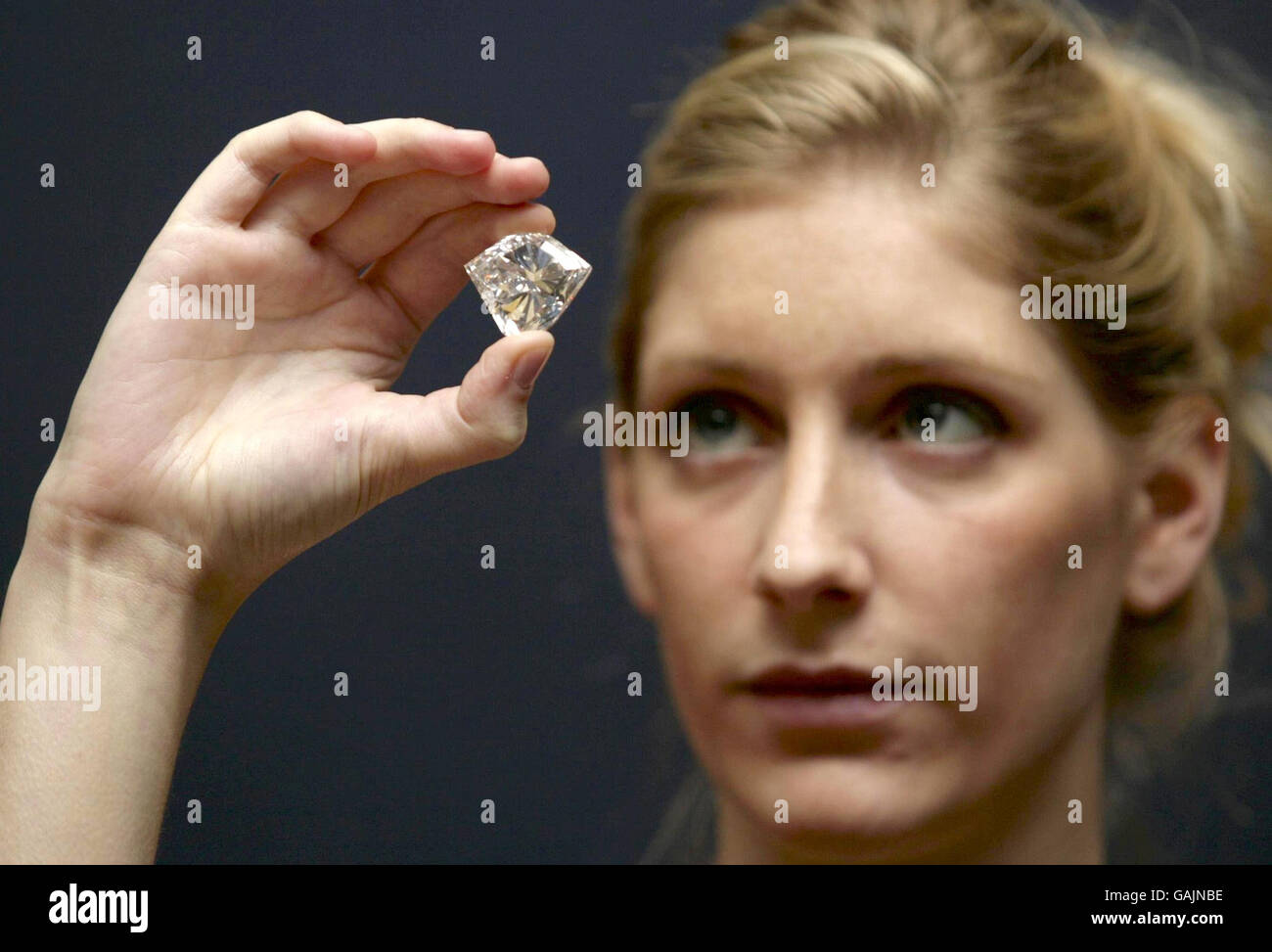 Alexandra Jeffrey of Christie's in London holds the largest colourless ...