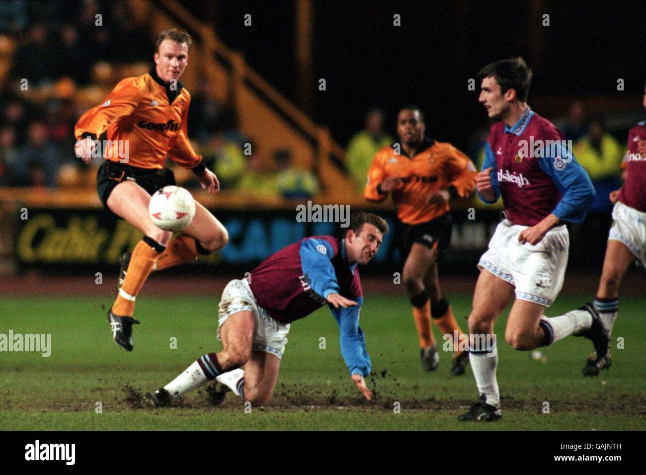 (L-R) Wolverhampton Wanderers' Neil Emblen is closed down by Burnley's ...