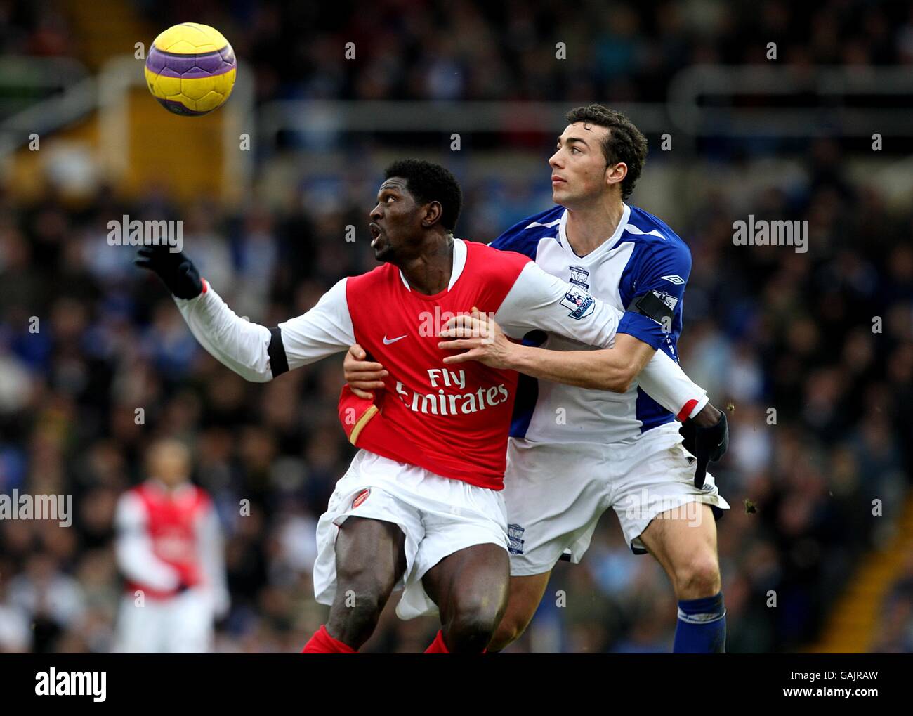 Arsenal's Emmanuel Adebayor and Birmingham City's Stephen Kelly battle ...