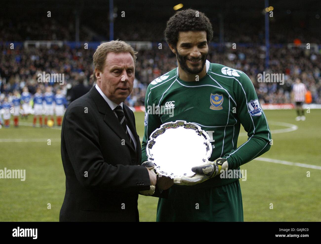Portsmouth goalkeeper David James receives an award for 500 Premier ...
