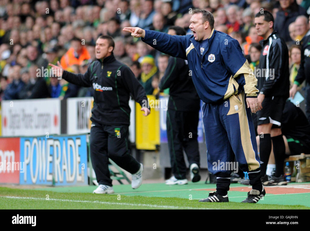 Barnsley's Manager Simon Davey shouts his orders from the sidelines ...