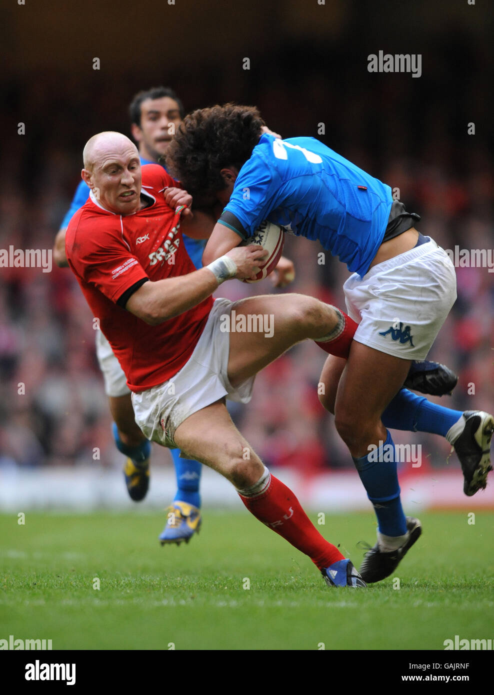 Wales tom shanklin tackles italys paolo buso hi-res stock photography ...